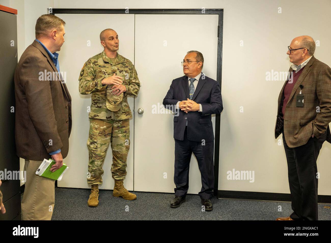 U.S. Army Col. Jacob Miller, 128th Aviation Brigade commander, and Luis ...