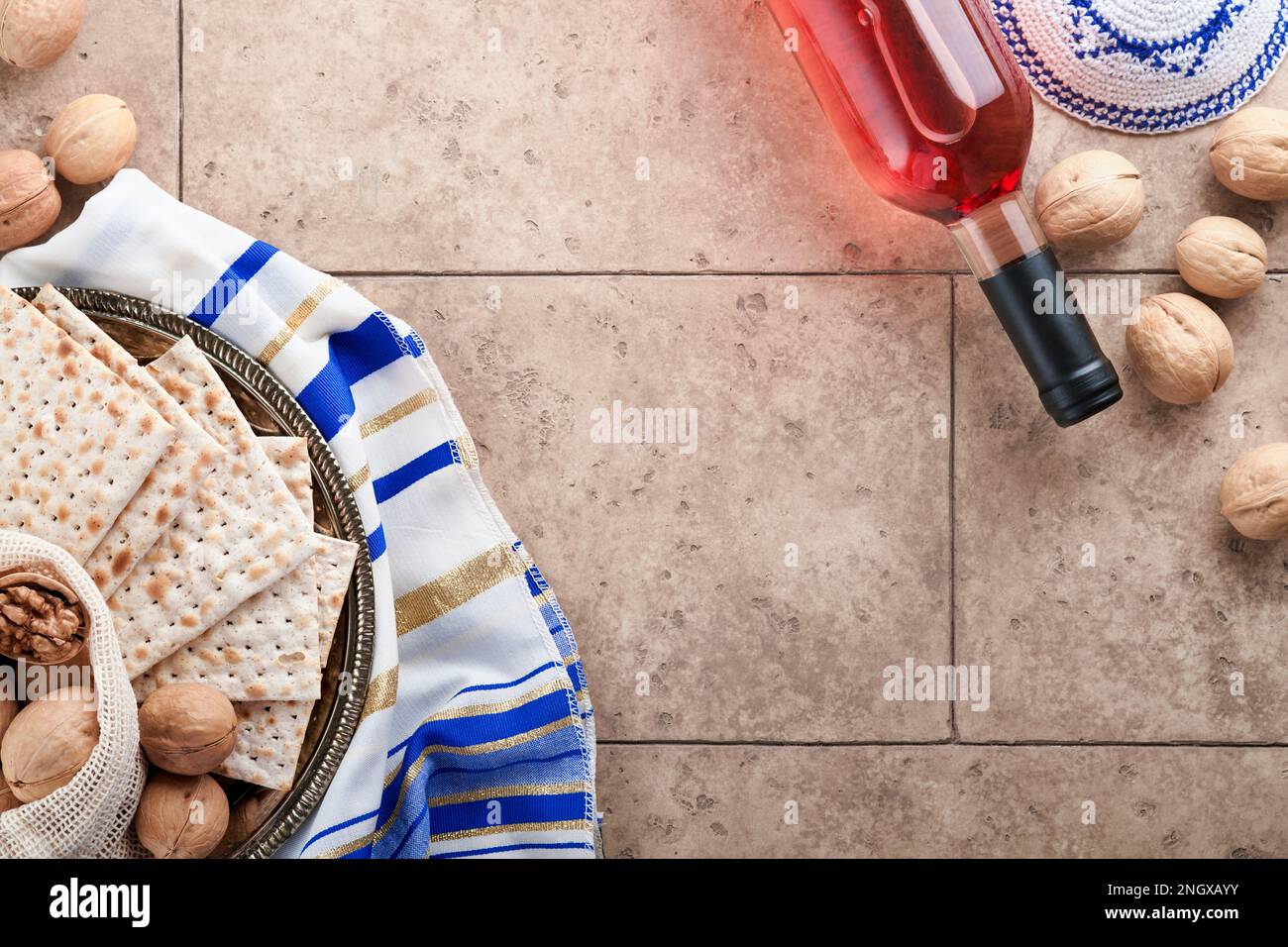 Passover celebration concept. Matzah, kosher red wine, walnut and white ...