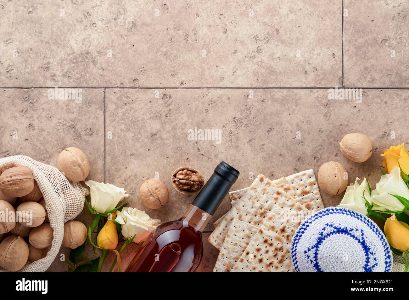 Passover celebration concept. Matzah, kosher red wine, walnut and white ...