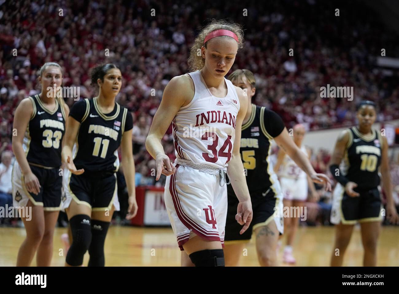 Indiana's Grace Berger (34) reacts after making a basket and getting ...