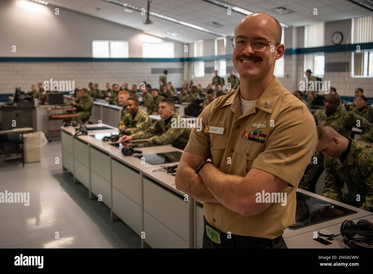 Engineman 2nd Class Michael Viruet poses for a portrait photo at ...