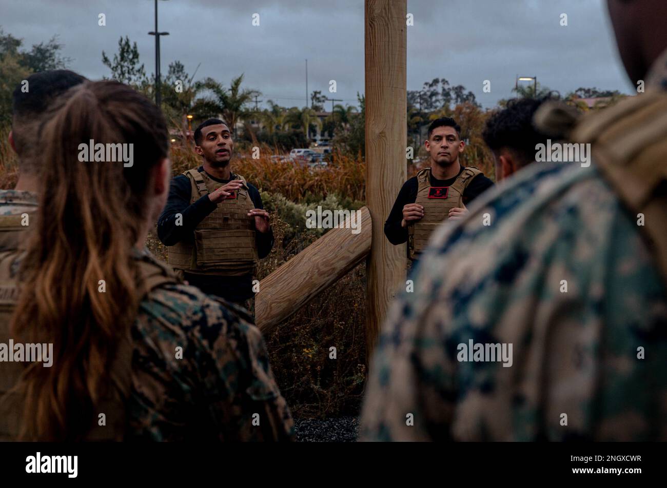 U.S. Marine Corps Sgt. Kishahn Hobley, left, and Sgt. Avery Luengo ...