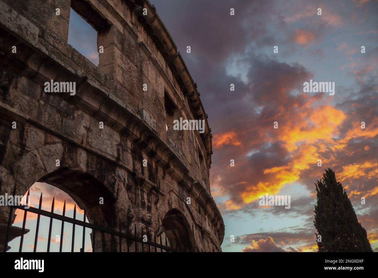 Roman Amphitheater with Dramatic Sunset Sky in Croatia. Pula Arena ...