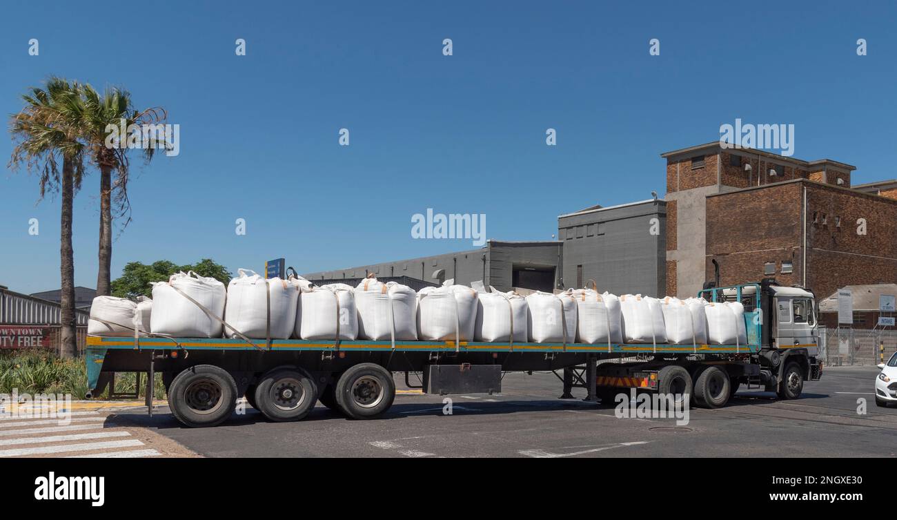 Cape Town South Africa. Flatbed lorry loaded with white sacks entering ...