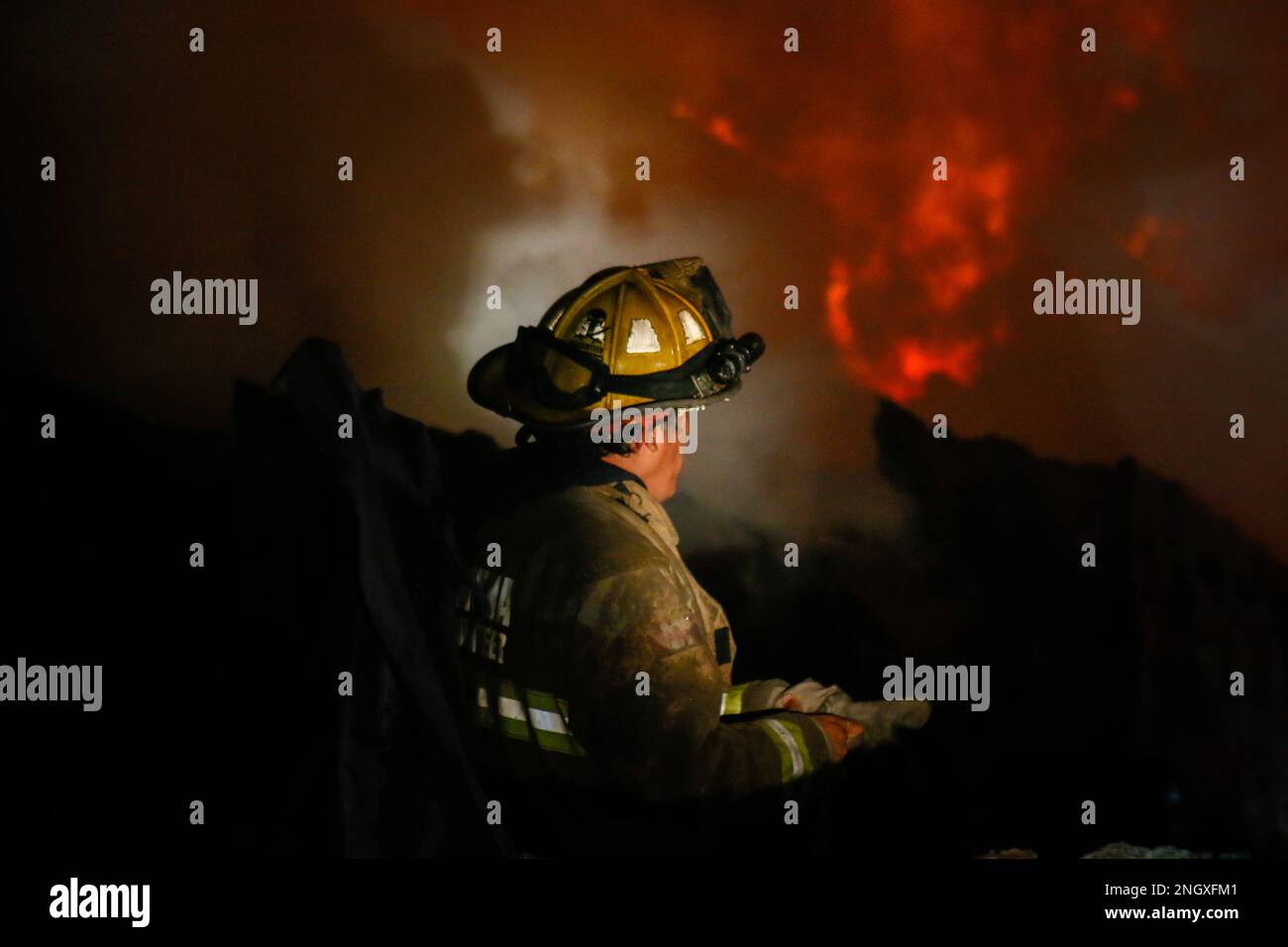 Teresa, Rizal, Philippines. 19th Feb, 2023. A fire volunteer entering ...