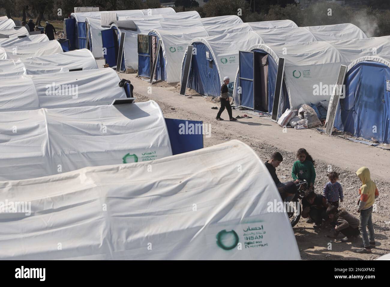 Salqin, Syria. 19th Feb, 2023. People are seen at an emergency shelter ...