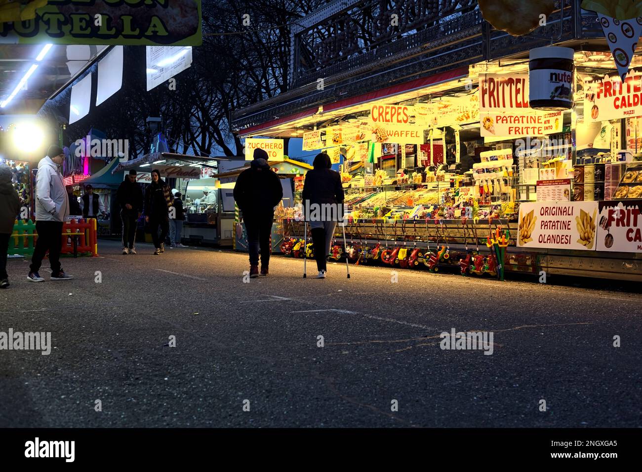 Food stalls at an amusement park at dusk Stock Photo - Alamy