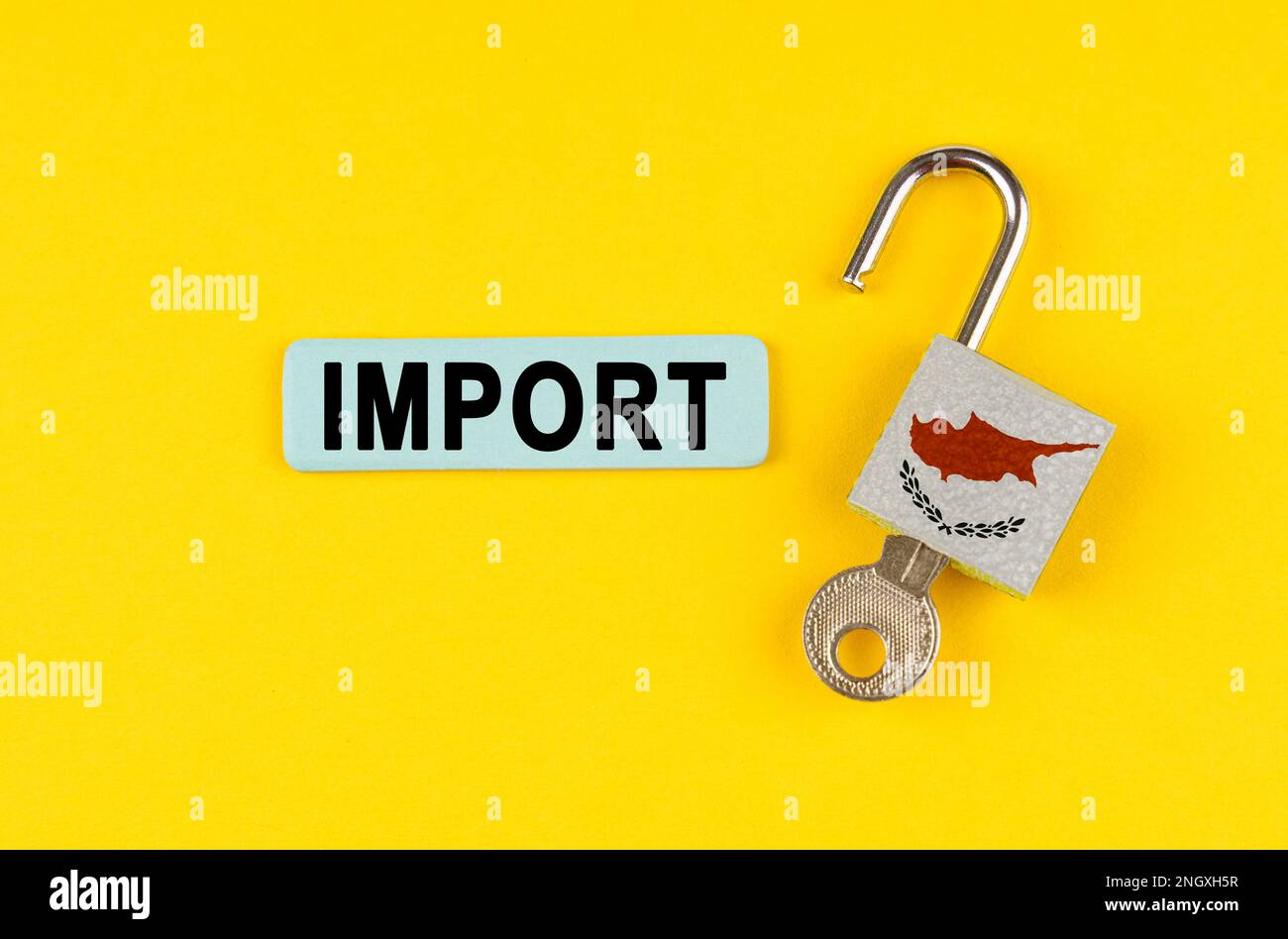 On a yellow surface, an open lock with the image of the flag of Cyprus ...
