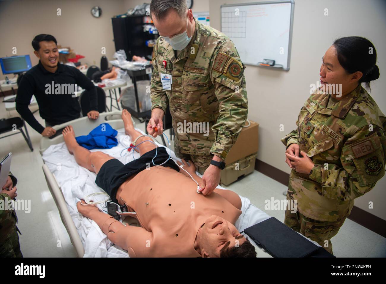 Master Sgt. Brian Balcom (center), 22nd Medical Group Flight Medicine ...