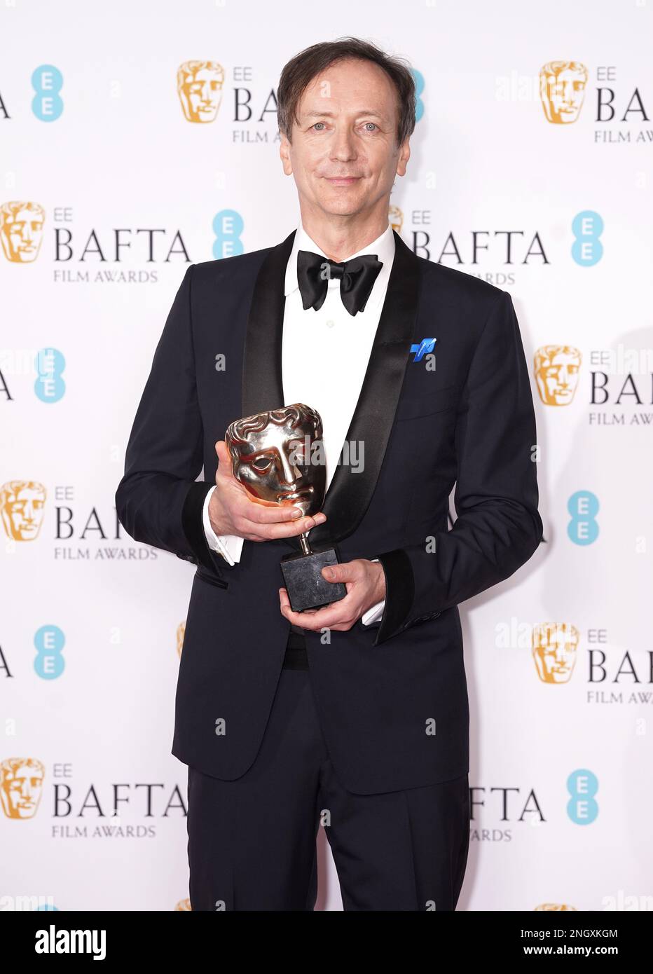 Volker Bertelmann poses with the award for Original Score Award for All ...