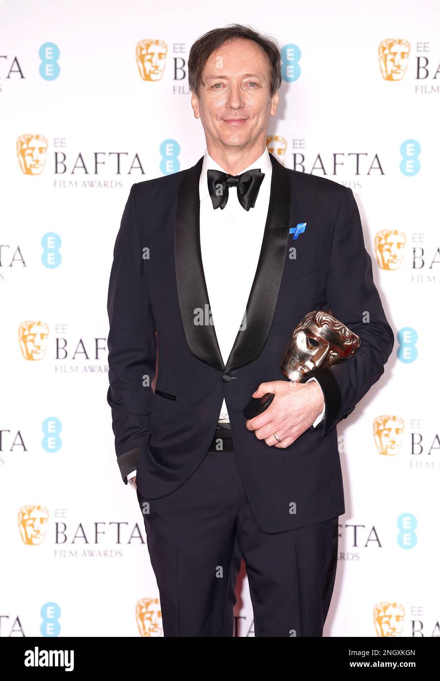 Volker Bertelmann poses with the award for Original Score Award for All ...