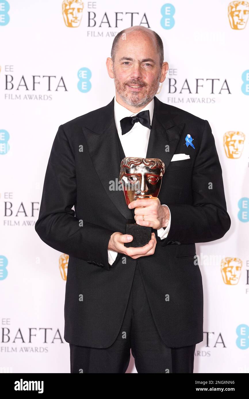 Edward Berger poses with the award for Best Director for All Quiet On ...