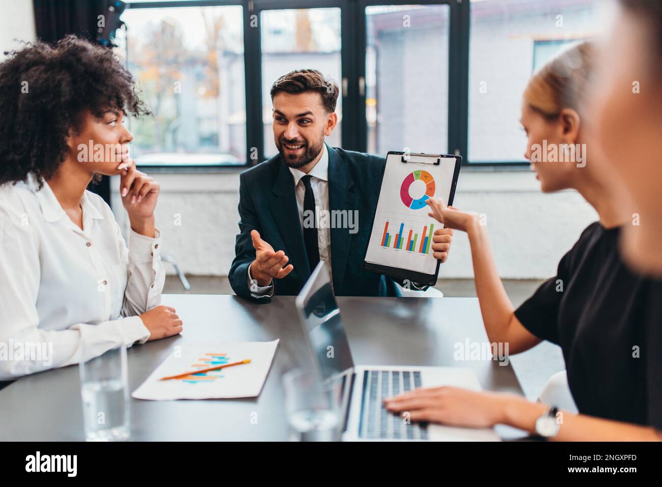 People work together as teamwork and partner with business graphs Stock ...