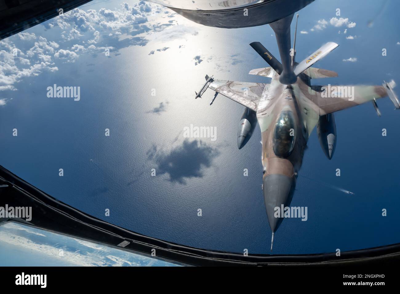 An Israeli Air Force F-16 Fighting Falcon refuels from a U.S. Air Force ...