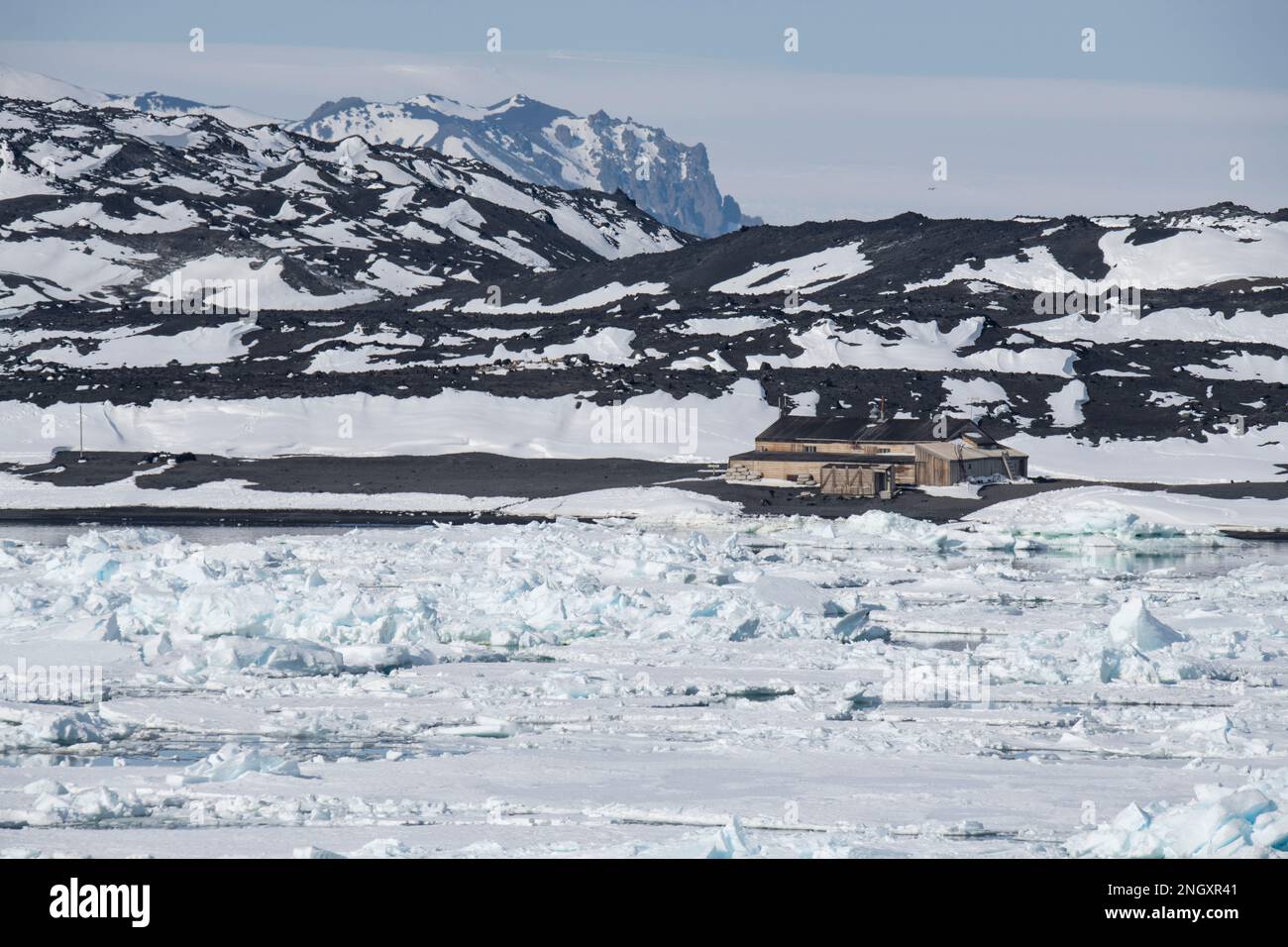 Antarctica, Ross Sea, Ross Island, Cape Evans. Coastal view of historic ...