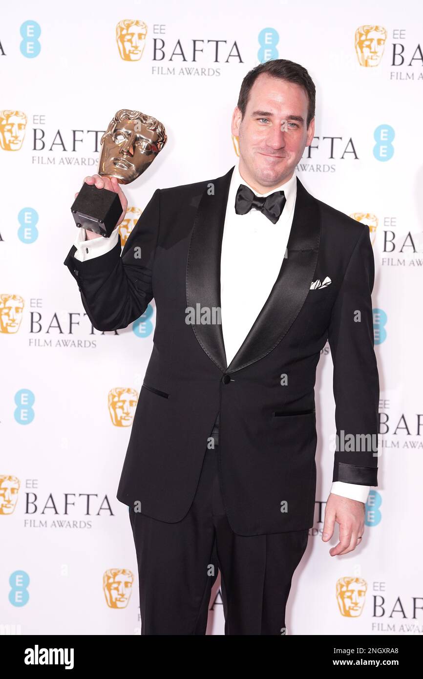 James Friend poses with the award for Cinematography for All Quiet on ...