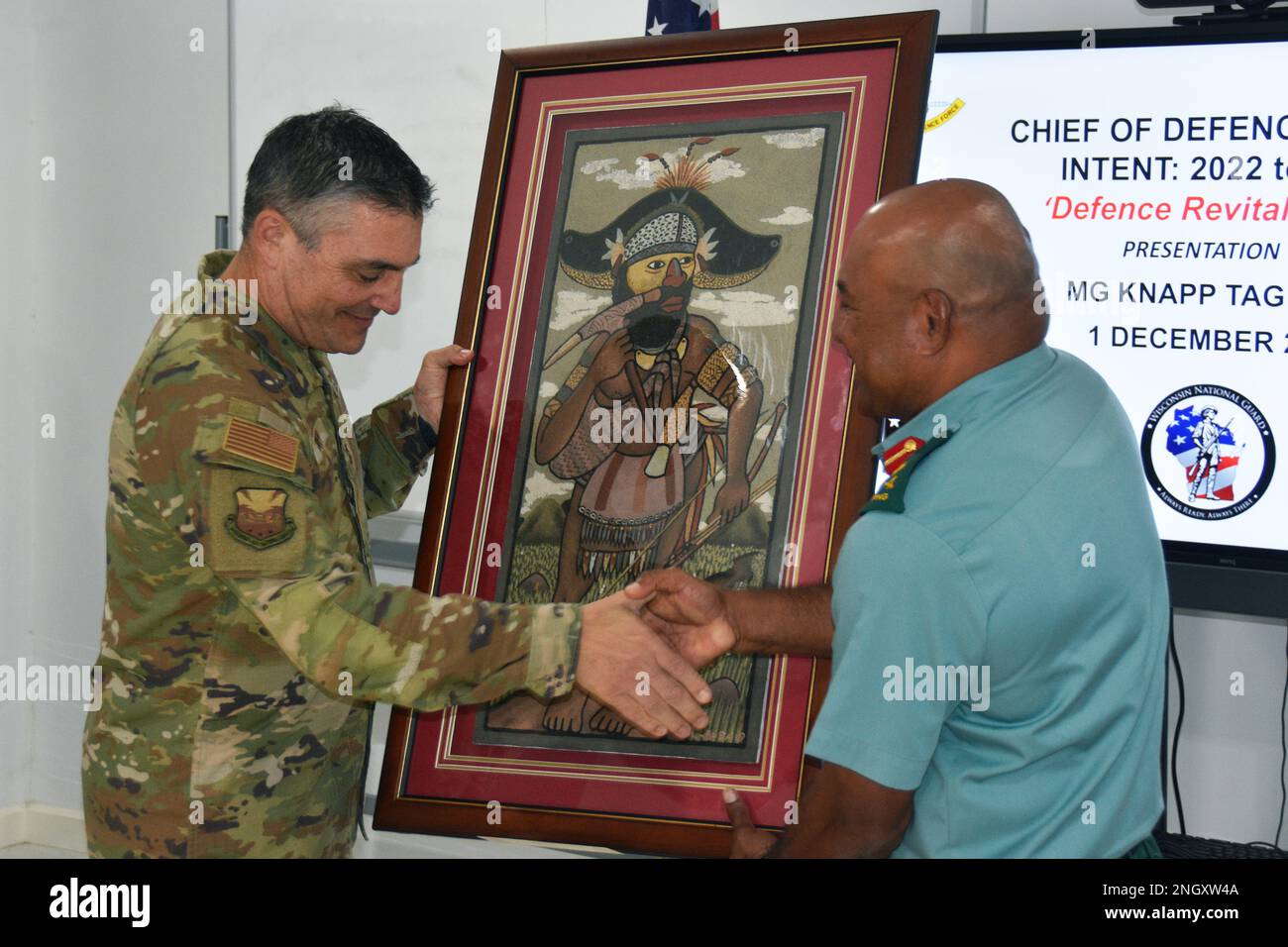 Maj. Gen. Paul Knapp, Wisconsin’s adjutant general, receives a gift ...