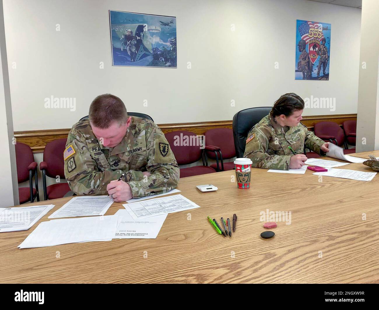 Staff Sgt. Randall Peaslee (left) conducts quality control of a ...