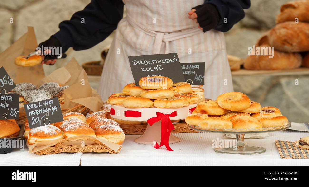 Bakery stand with pastries at the farmers market in Prague offering ...