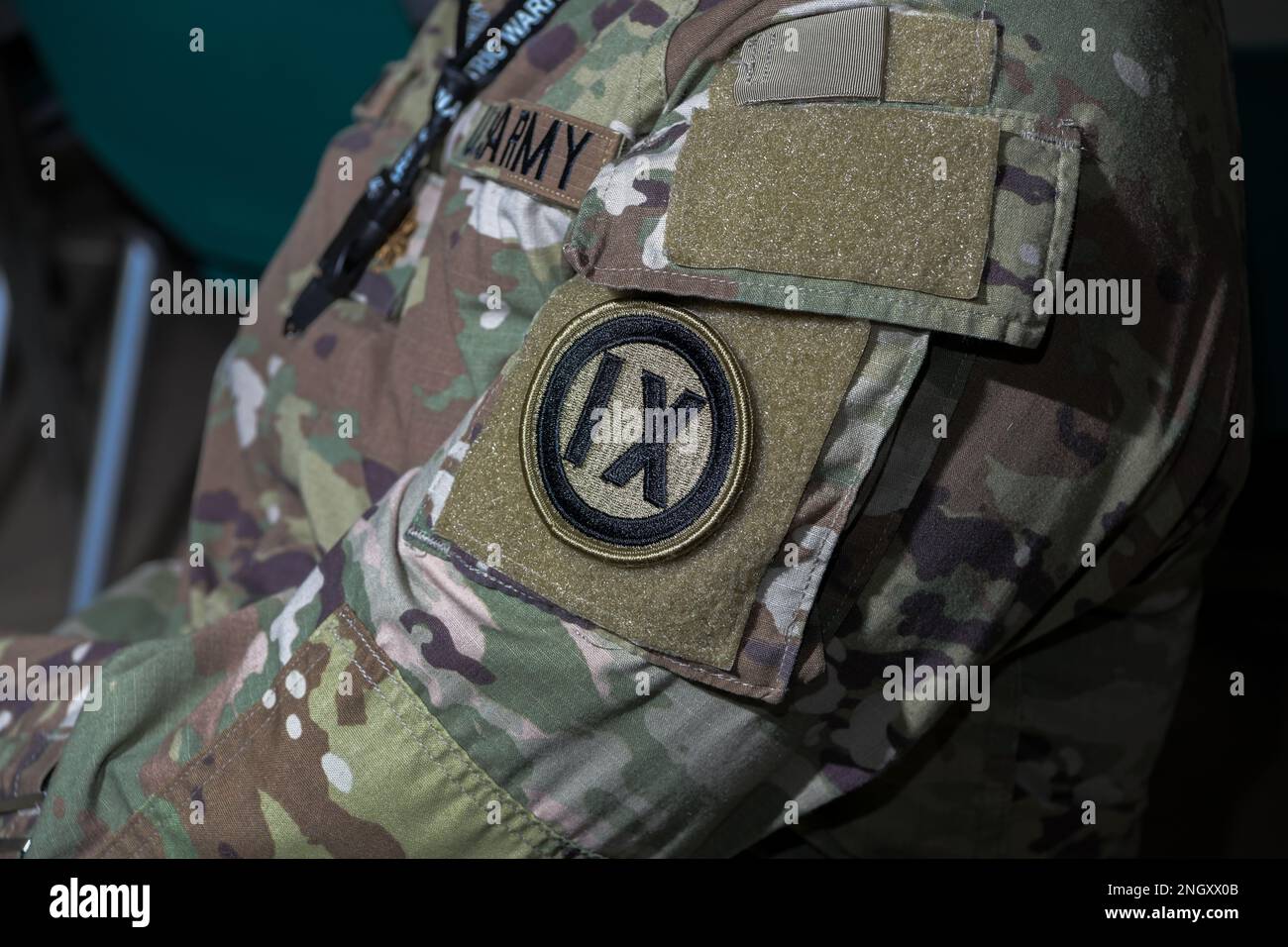 A 9th Mission Support Command patch is worn by U.S. Army Maj. Caleb ...