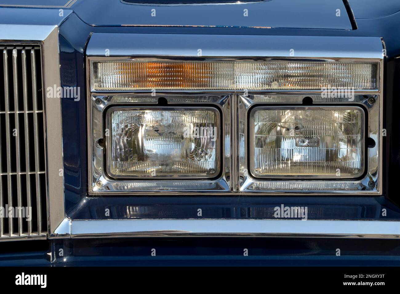 Paired rectangular sealed-beam headlights on a 1982 Chrysler New Yorker ...
