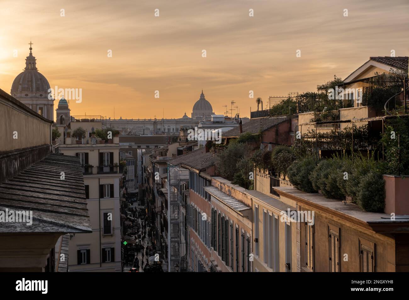 Perspective of roofs and street at sunset in Roma Stock Photo - Alamy