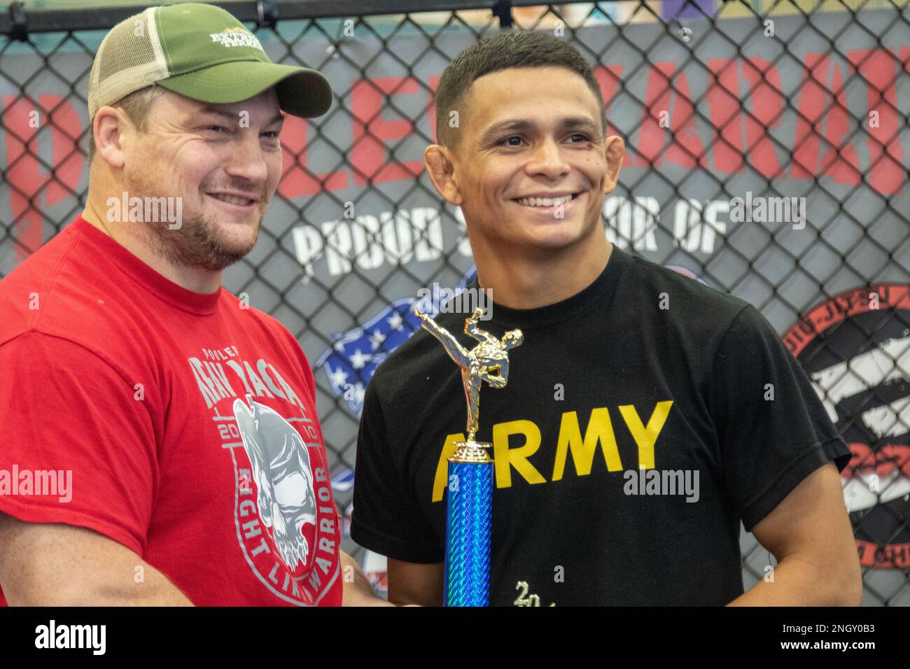 A Soldier assigned to the 3rd Infantry Divsion receives an award in the ...