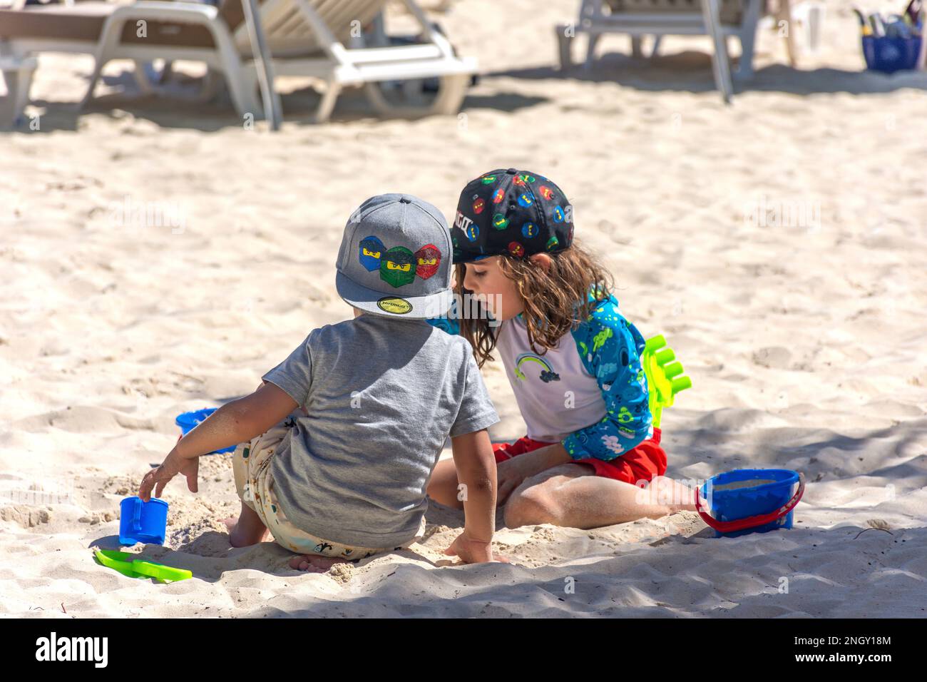 Children playing on beach, Orient Bay (Baie Orientale), St Martin ...