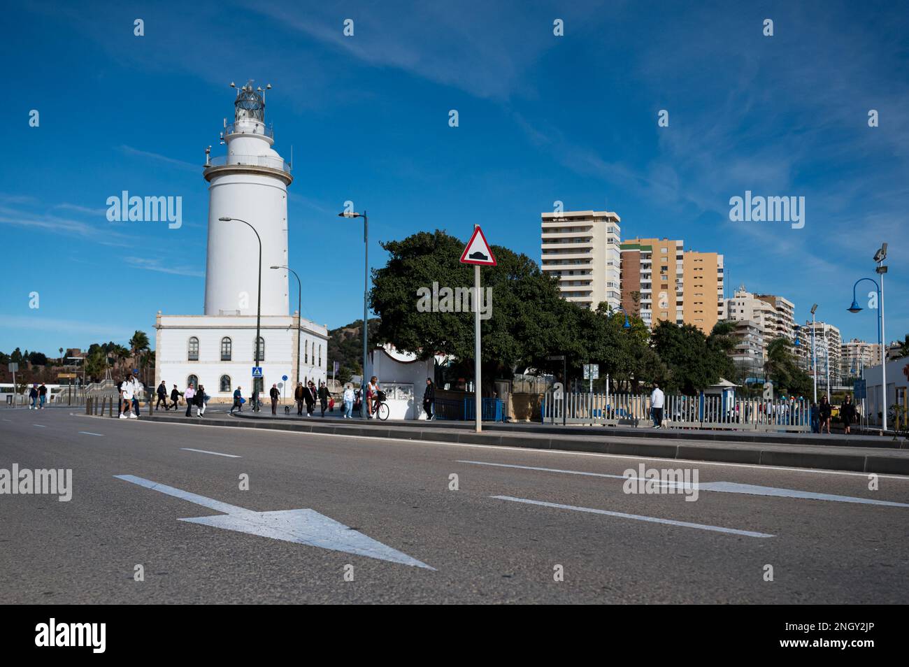 Malaga, Spain - January 15, 2023: Lighthouse in the Malaga harbour with ...