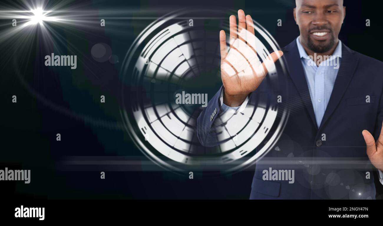 Composition of smiling businessman touching screen with scope scanning ...