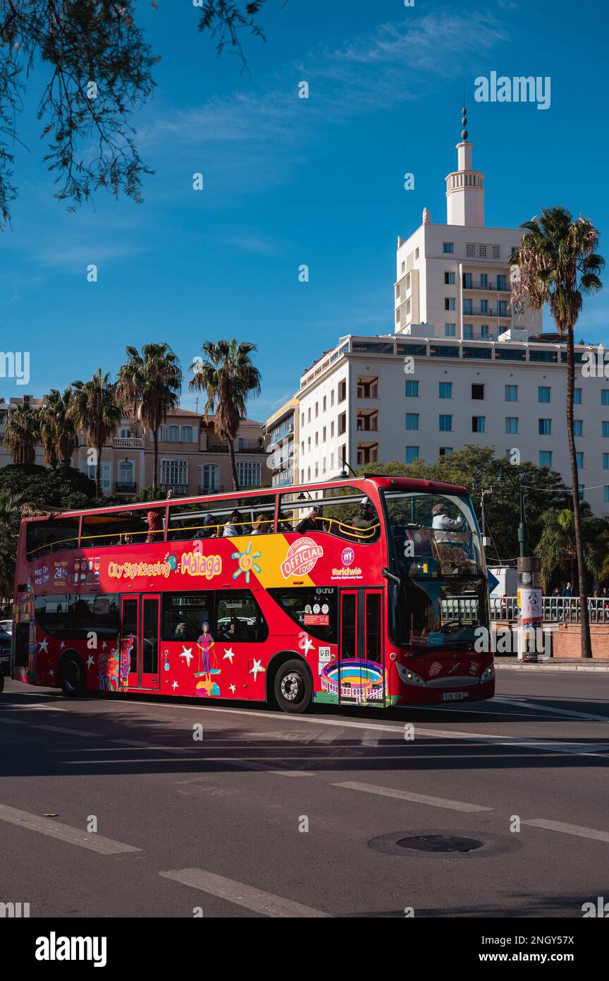Malaga, Spain - January 16, 2023: Welcome to Malaga! Hop on the red ...