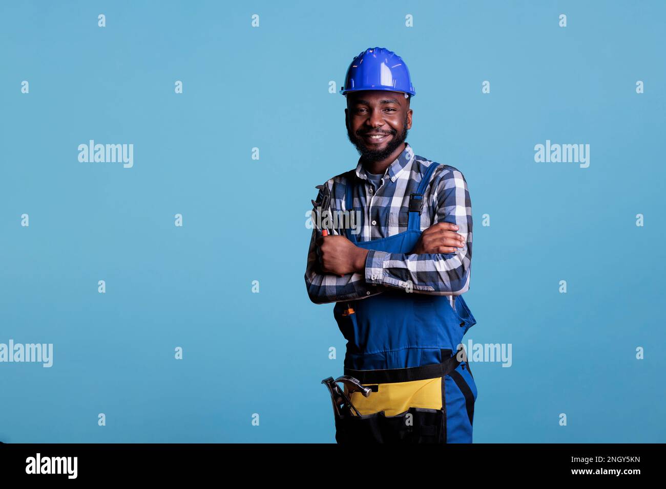African american construction worker with happy face wearing a helmet ...