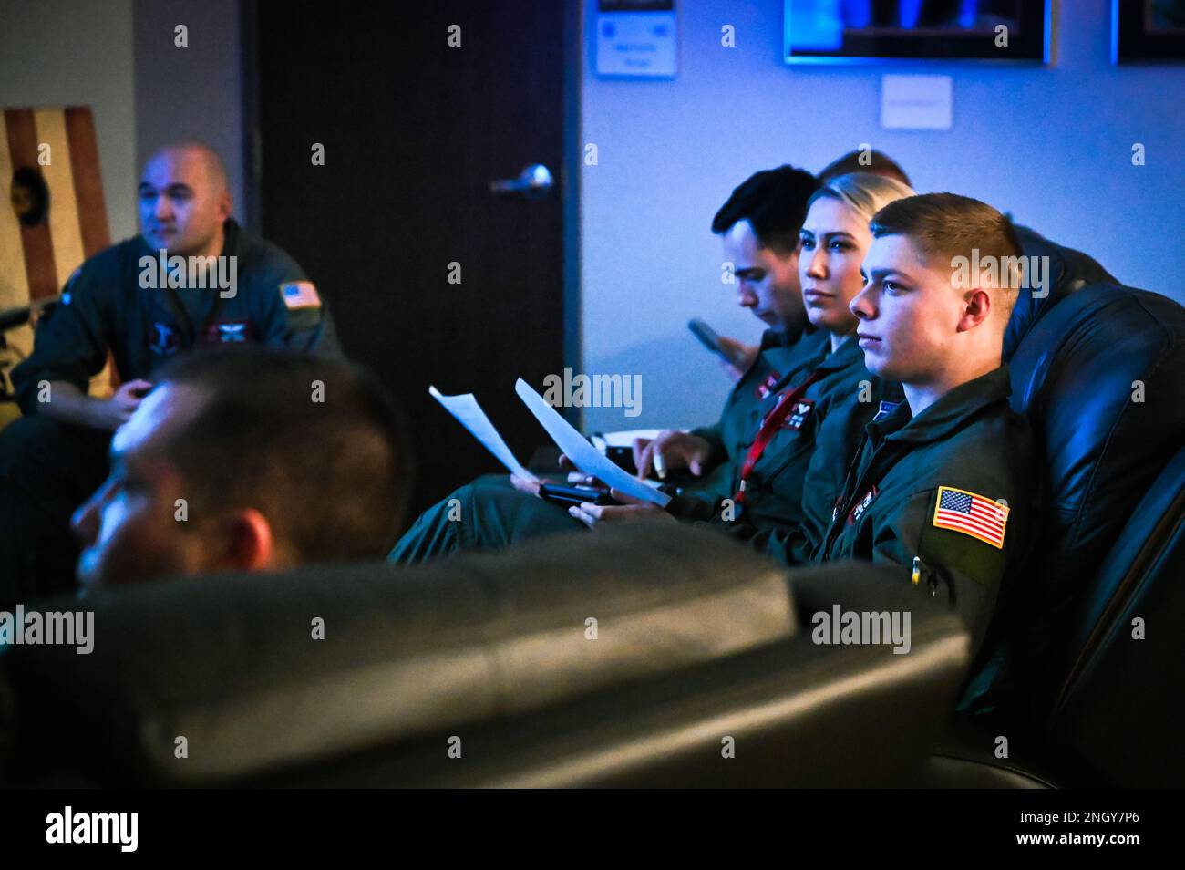 Flight crew from the 155th Air Refueling Wing listen to a briefing, Dec ...