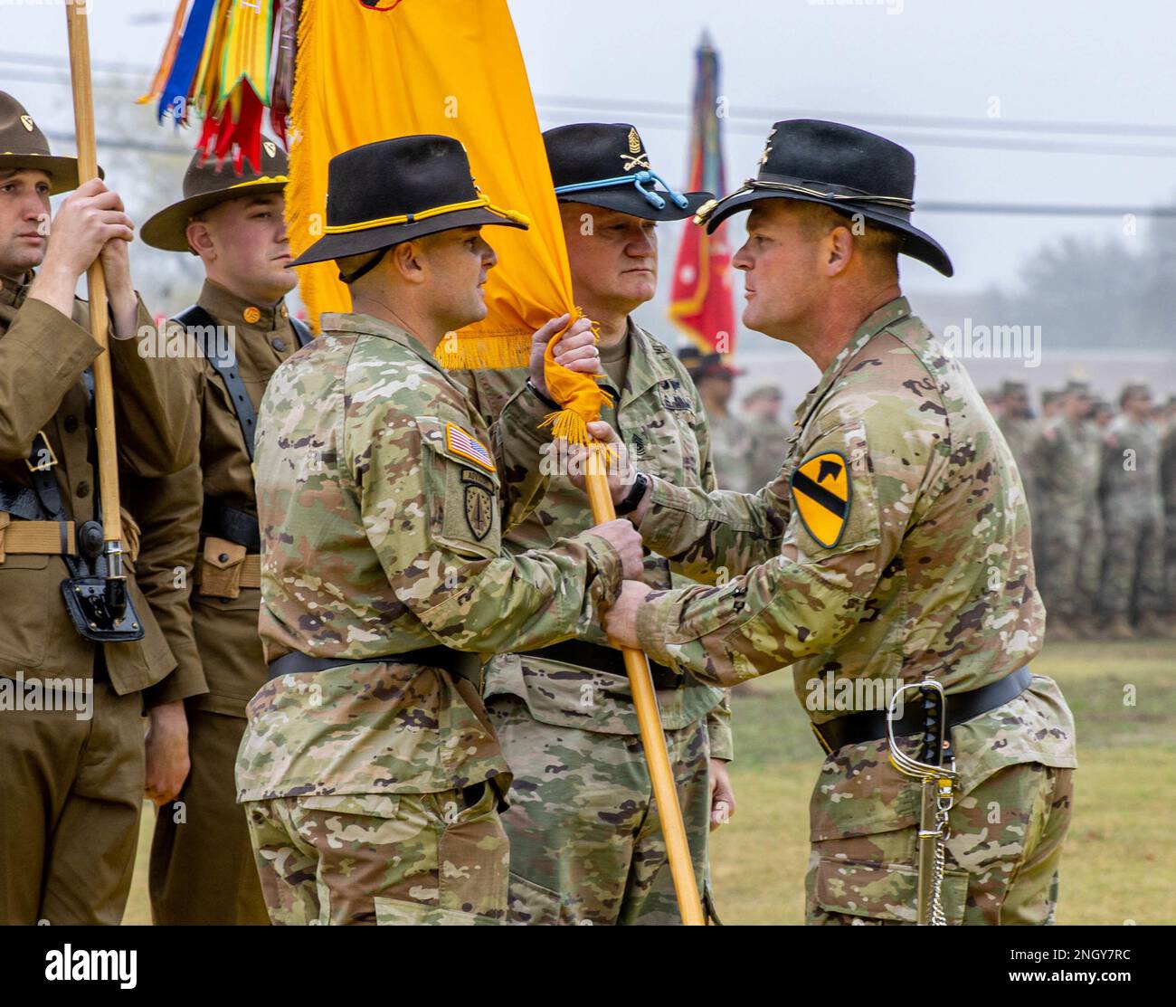 Command Sgt. Maj. Steven Campbell passes the 2nd Armored Brigade Combat ...