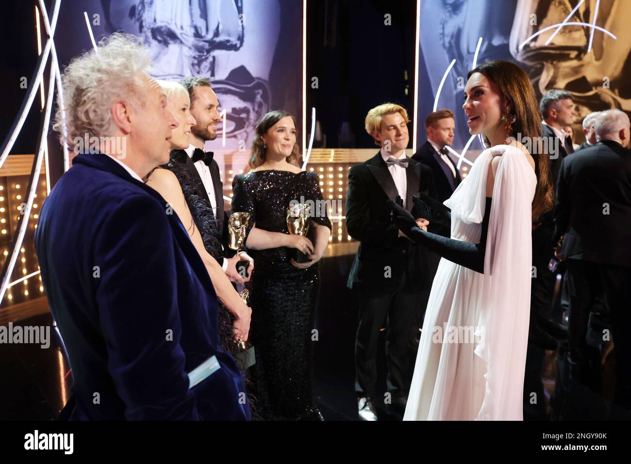 The Princess of Wales speaks to Charlie Mackesy (left), Peter Baynton ...