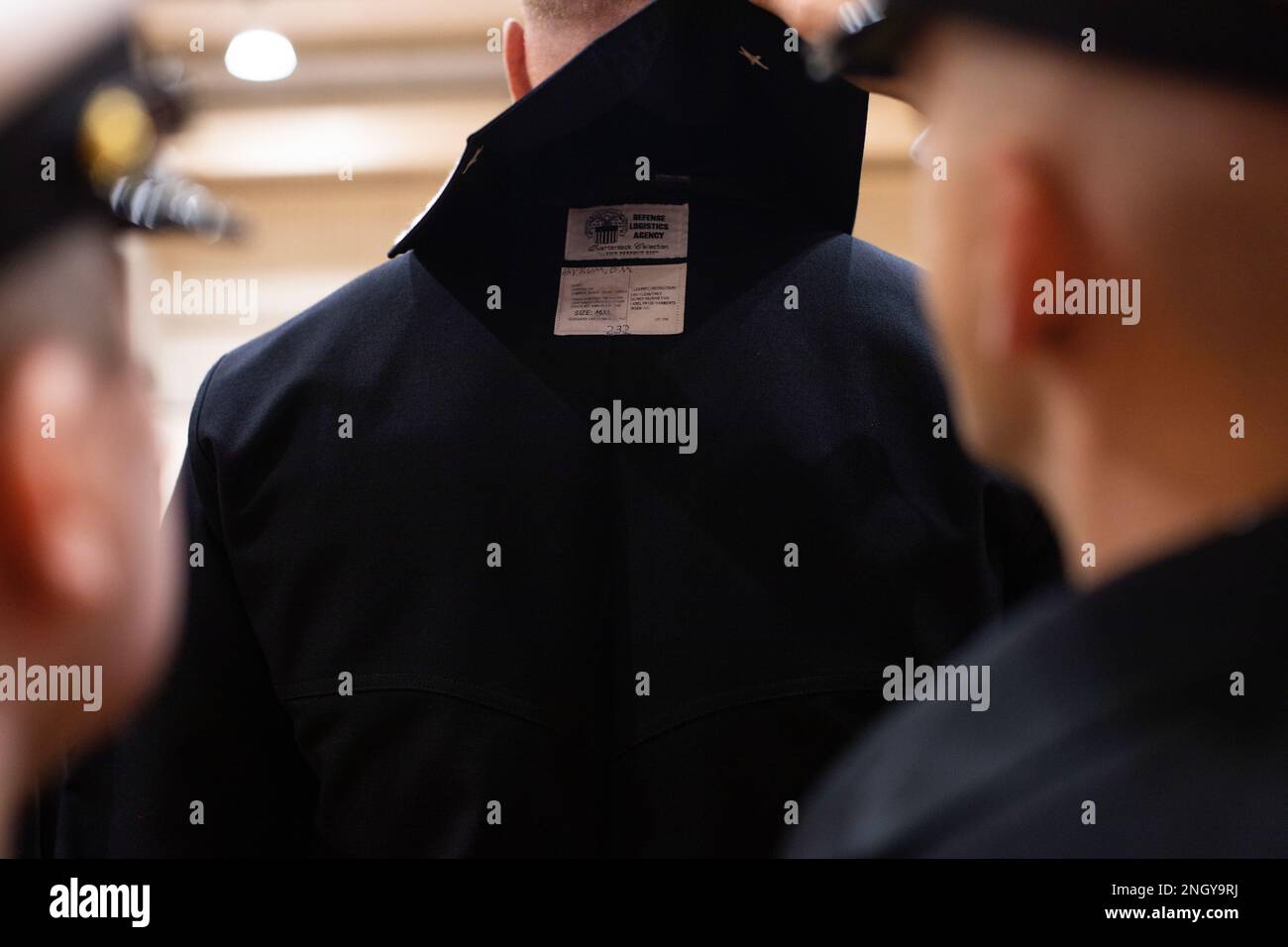 Individual uniform items are inspected during a service dress blue ...