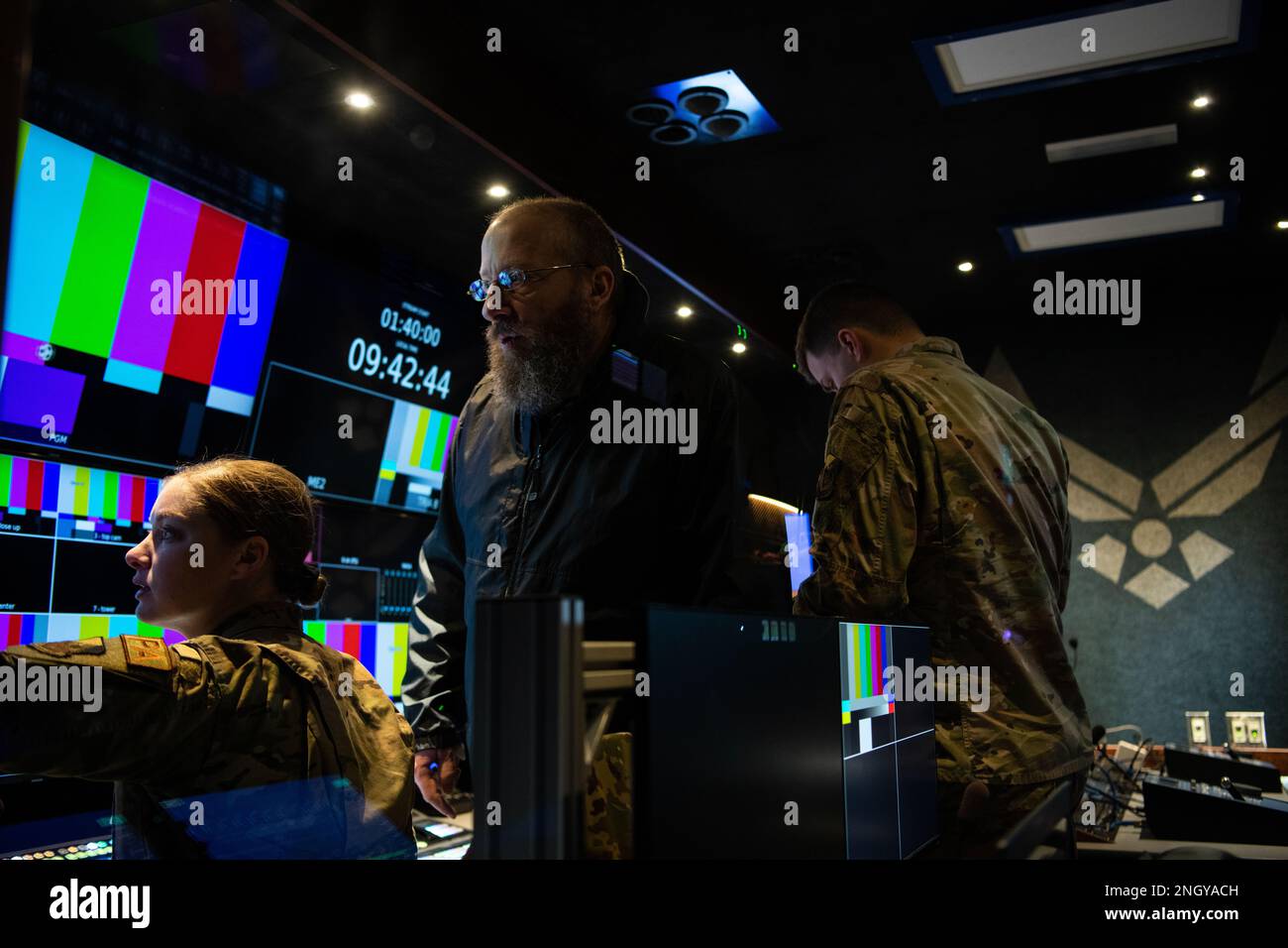 Members of the 2d Audiovisual Squadron prepare for the practice run of ...