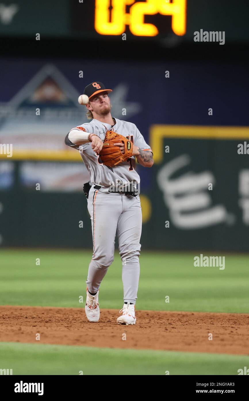 February 18, 2023: Roc Riggio #7 Oklahoma State infielder makes a throw ...