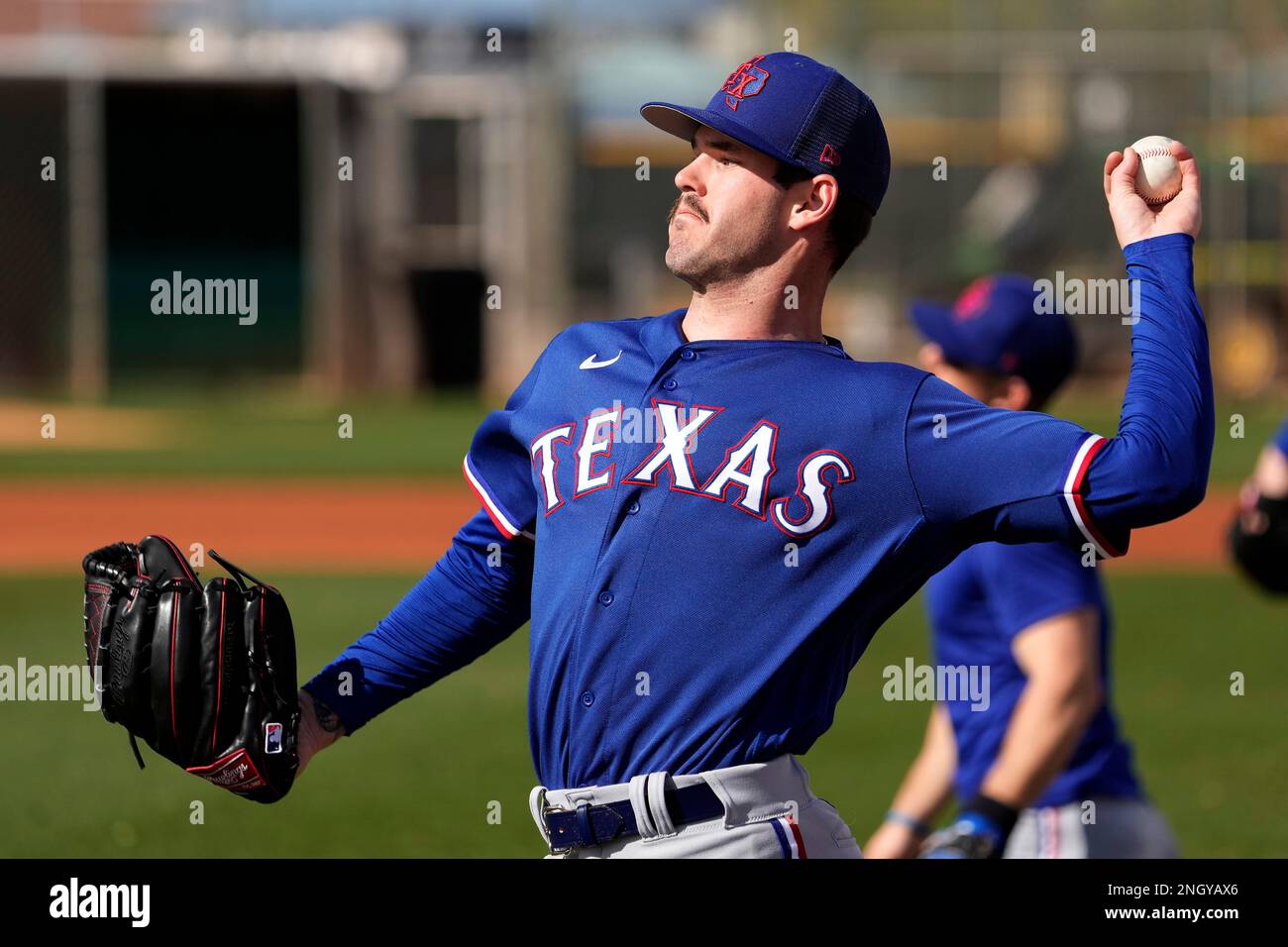 Texas Rangers pitcher Cole Ragans throws during spring training ...