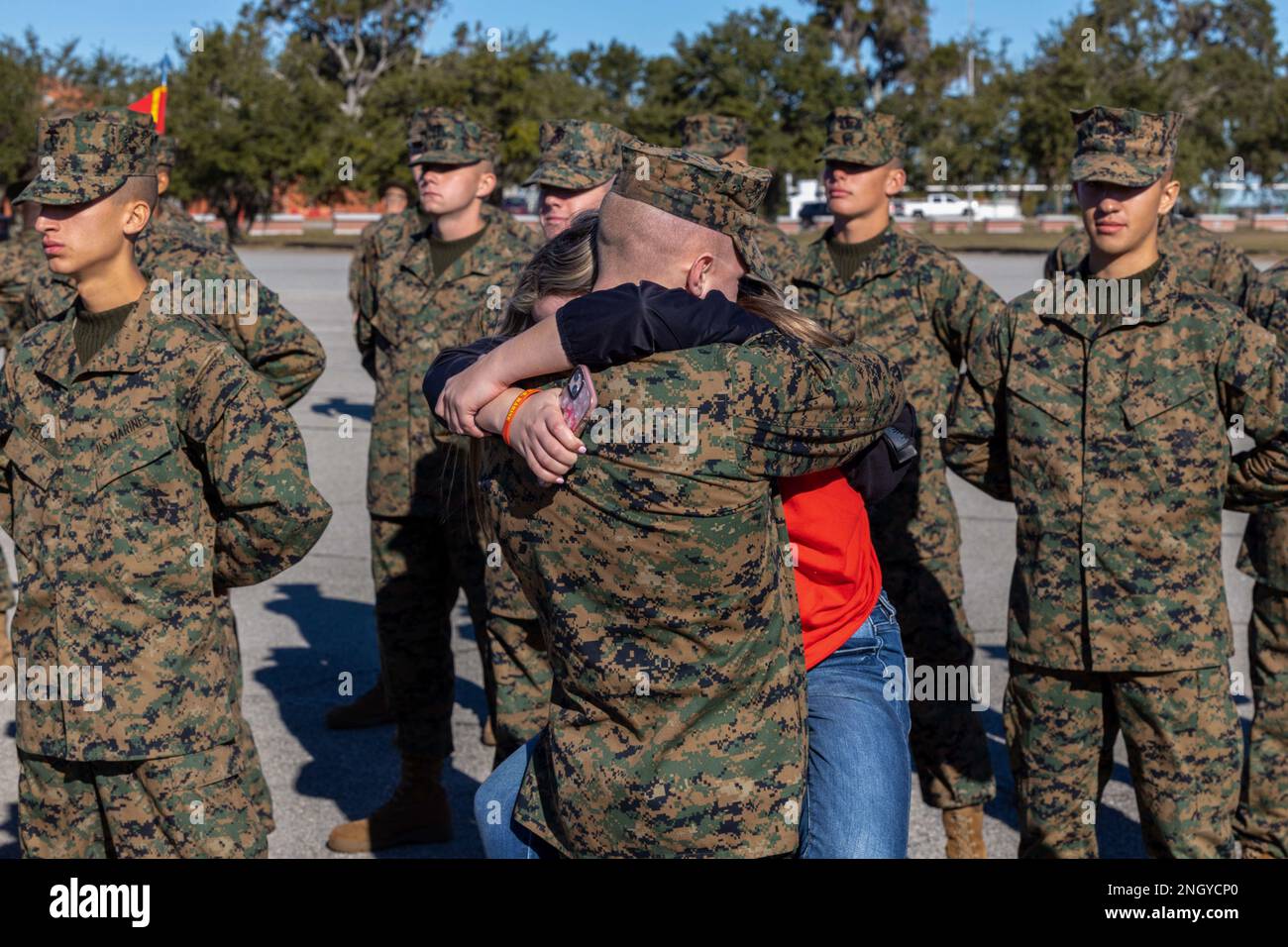 Marines with Delta Company, 1st Recruit Training Battalion, embrace ...