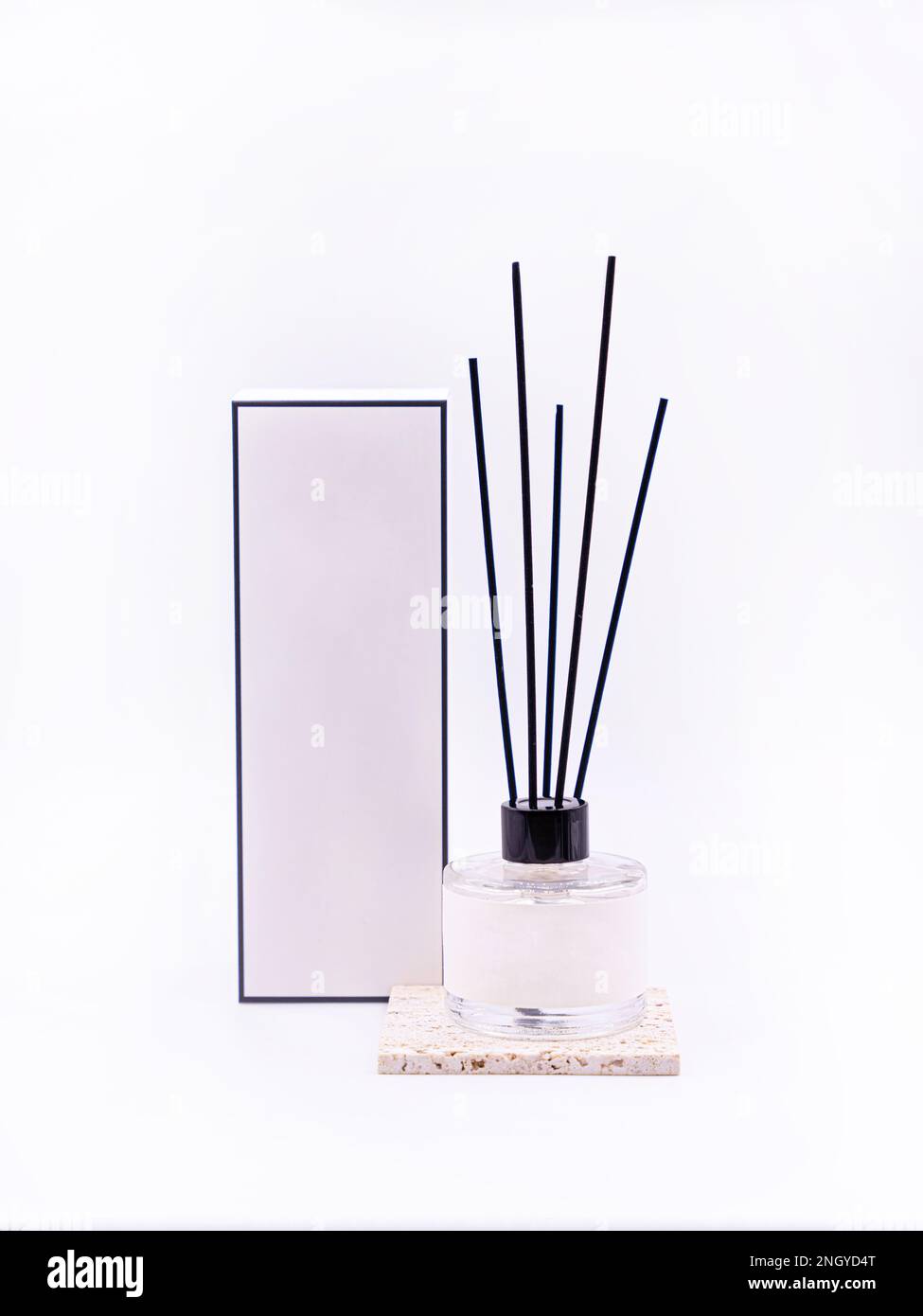 Wooden aroma sticks in a glass flask filled with flavor liquid ...