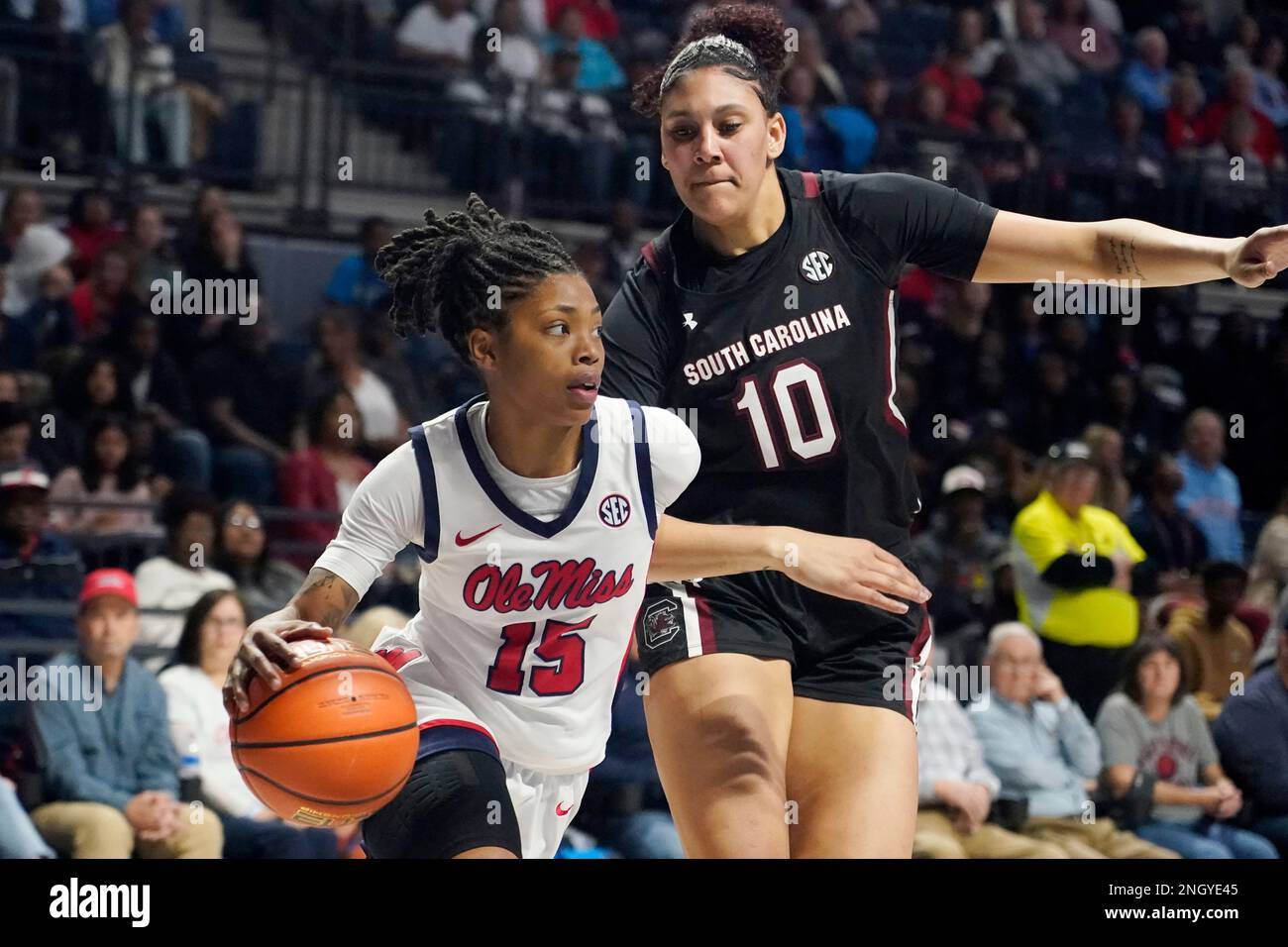 Mississippi guard Angel Baker (15) dribbles past South Carolina center ...