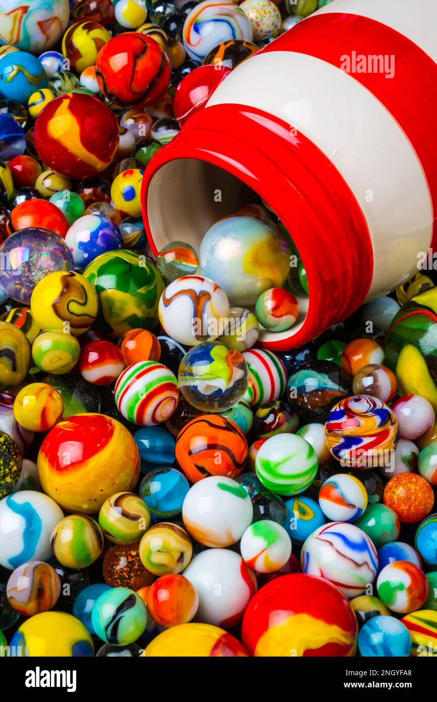 Small Yellow marble jar with brass rim