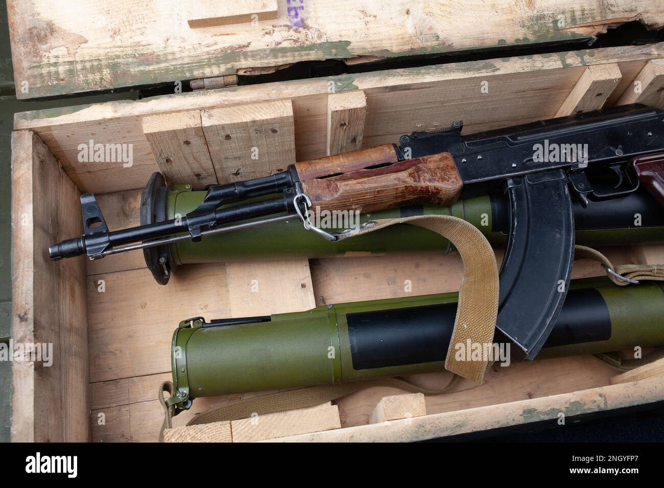 Kalashnikov AK47 gun and "Bazooka" RPG grenade launchers in army green ...