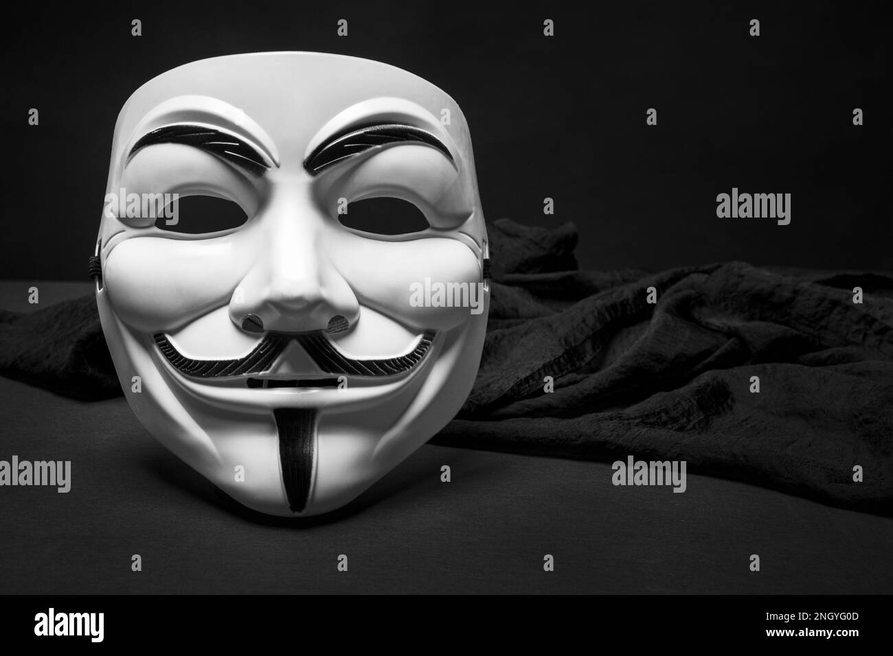 A mask of those used by the anonymous with a black cloth and a black ...
