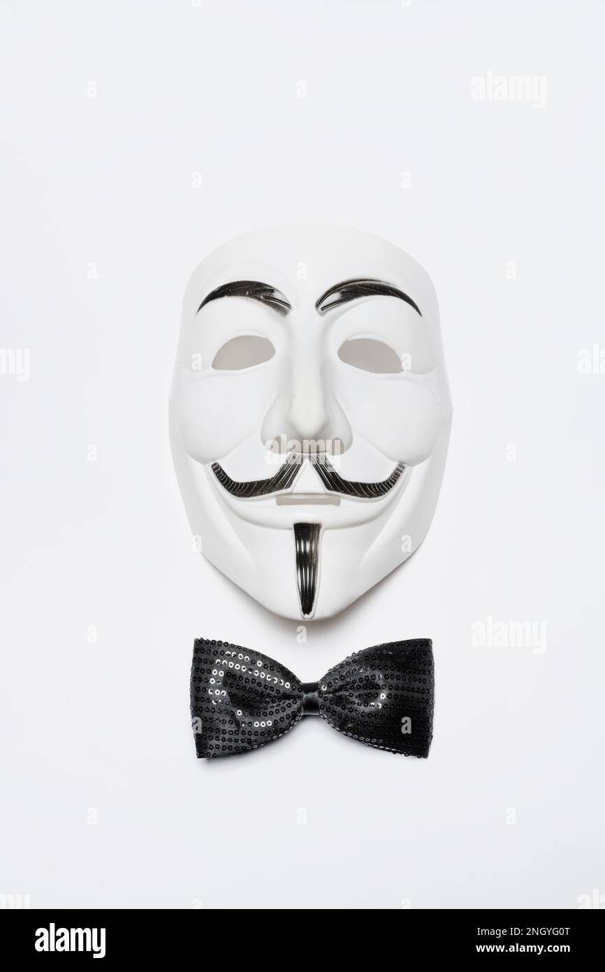 Anonymous face costume mask with fancy bow tie with sequins Stock Photo ...