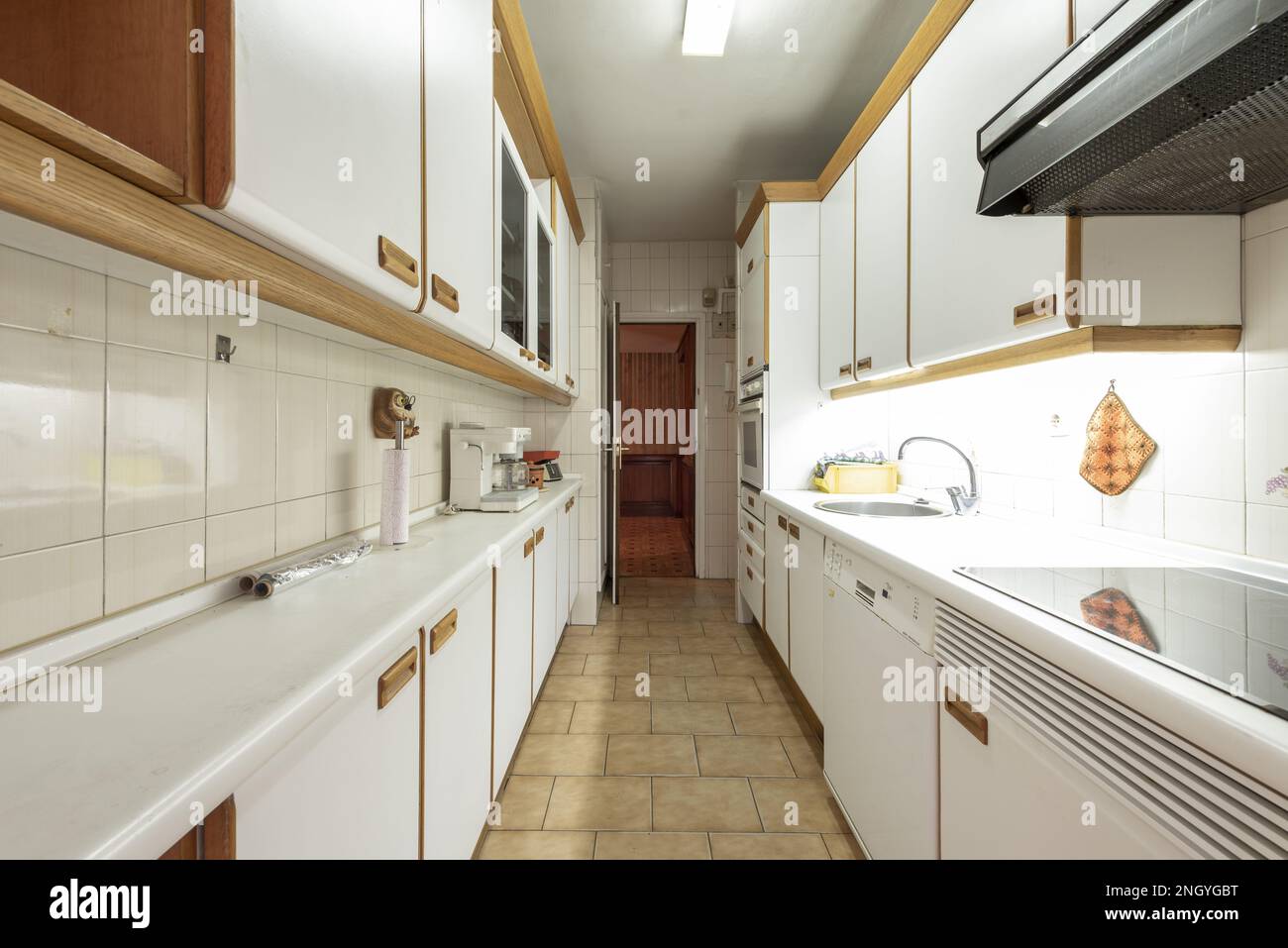 kitchen with smooth white cabinets, oak trim and accents, white faux ...