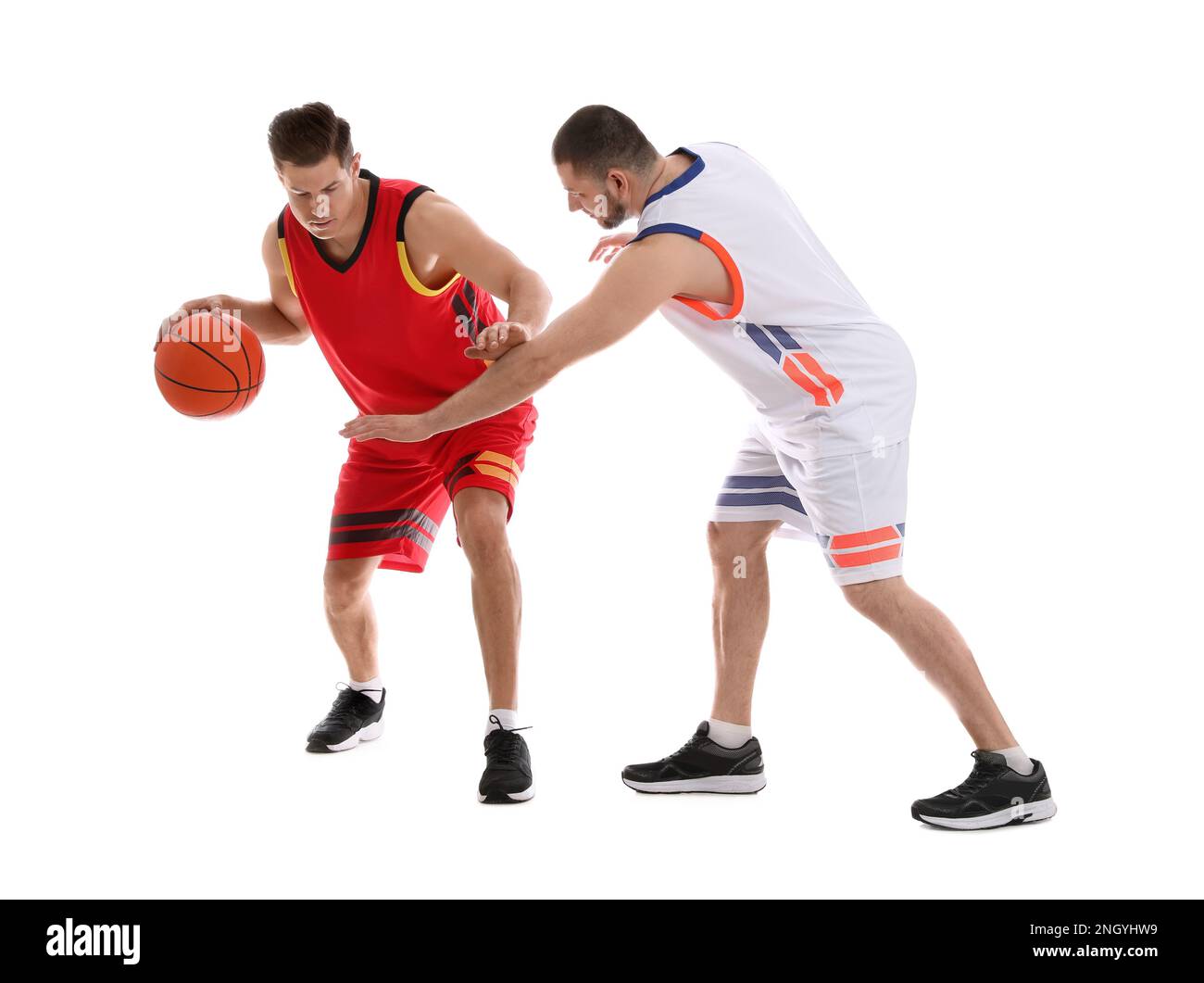 Professional sportsmen playing basketball on white background Stock ...