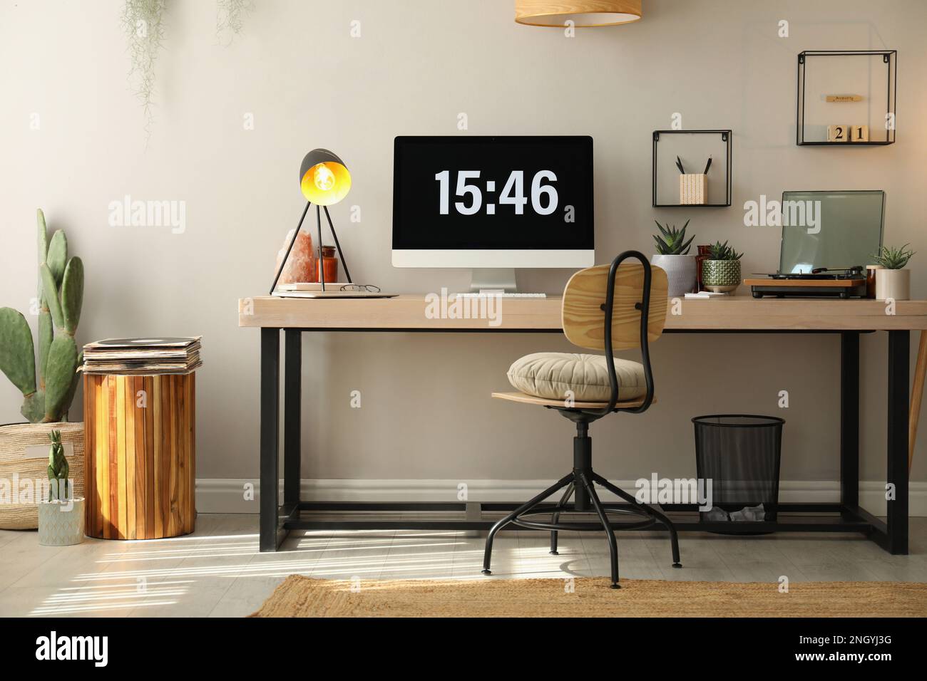 Room interior with comfortable workplace. Modern computer on wooden ...