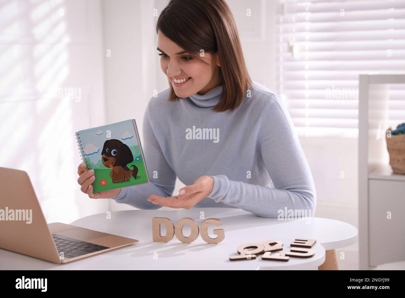 Happy English teacher giving online lesson. Early childhood education ...